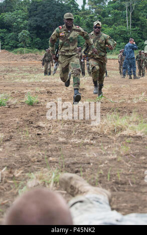 Gabonese Armed Forces soldiers during a simulated combat exercise at ...