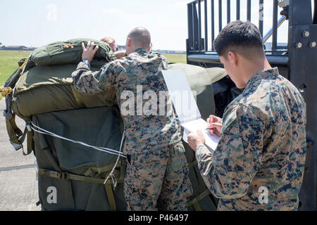 Parachute riggers from the Aerial Delivery Platoon, 11th Quartermaster ...