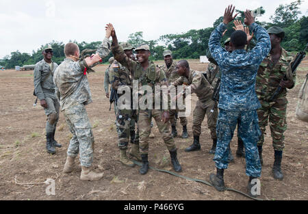Gabonese Armed Forces soldiers cheer alongside U.S. military during a ...