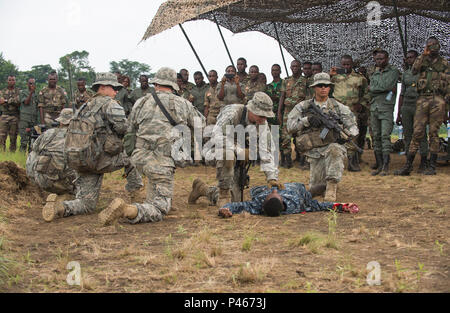 Gabonese Armed Forces soldiers during a simulated combat exercise at ...