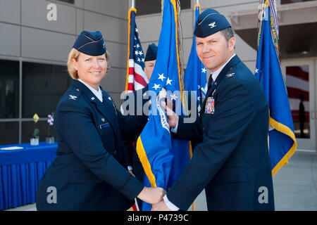 Col. Toby Doran, 50th Operations Group commander, hands the 50th ...