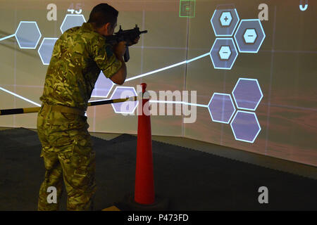 A British soldier trains his marksmanship skills at the Training ...
