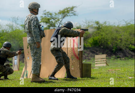 Guatemala National Civil Police officer with automatic weapon near ...