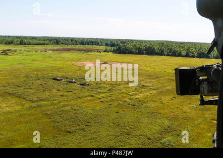 A gunner from 2nd Assault Helicopter Battalion, 82nd Combat Aviation ...