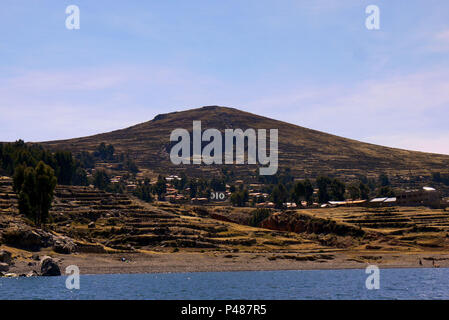 The terraced landscape of a steeply sloping Taquile Island a settlement ...