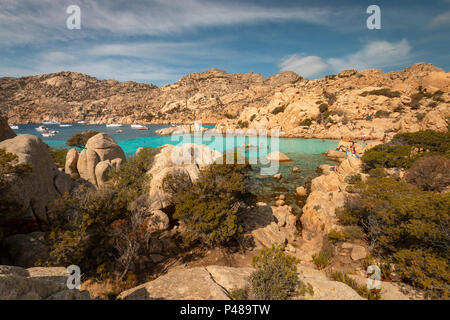 Caprera, Italy - September 8, 2017: Beach life with people sitting on ...