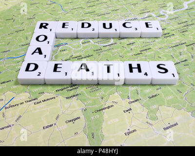 reduce road deaths message on London map background Stock Photo - Alamy