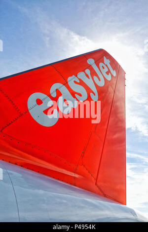 Close-up of an easyJet plane tail fin outside the easyFood and easyBus ...