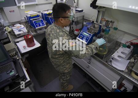 U.S. Army Reserve Spc. Andy Ngo, Petroleum Lab Specialist, 329th ...