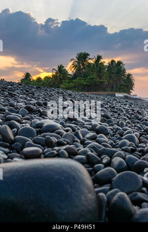 A brilliant sunrise in a tropical beach location Stock Photo - Alamy