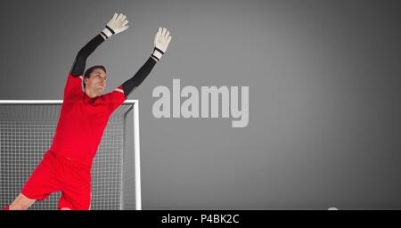 Goalkeeper saving goal Stock Photo - Alamy