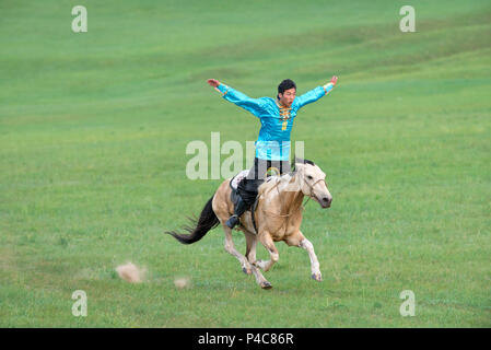 Young horsemen demonstrate team riding, Zhenglanqi Wuyi Farm, Inner ...