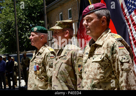 Army Lt. Gen. John Nicholson Jr., right, gets a kiss from his wife ...