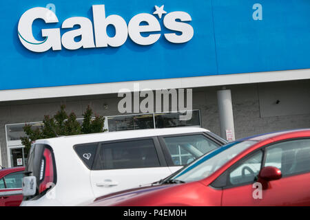 A logo sign outside of a Gabe's retail store location in Martinsburg ...