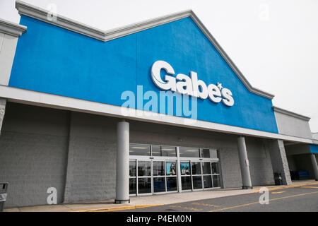 A logo sign outside of a Gabe's retail store location in Martinsburg ...