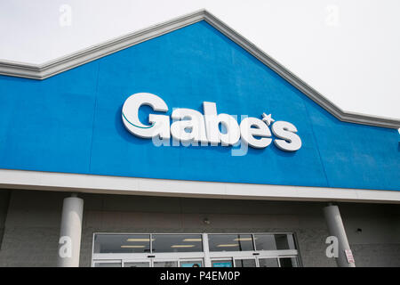 A logo sign outside of a Gabe's retail store location in Martinsburg ...