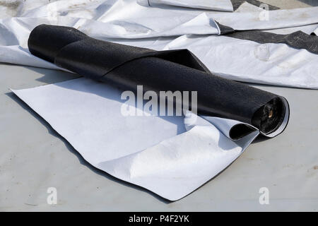 Waterproof bitumen roll with double sides covered with insulation ...