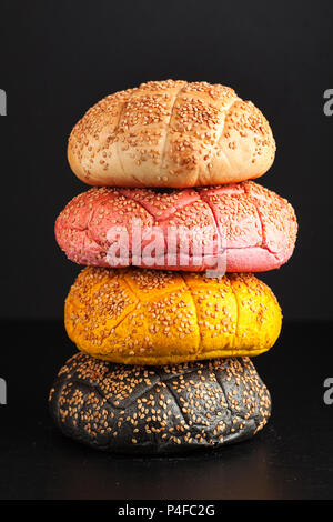 Healthy homemade colored bread buns for burgers. Purple bootroot, green ...