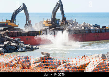 New stone groyne for coastal protection Stock Photo - Alamy