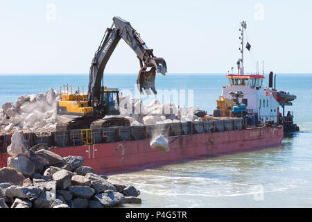 New stone groyne for coastal protection Stock Photo - Alamy