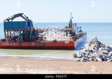 New stone groyne for coastal protection Stock Photo - Alamy
