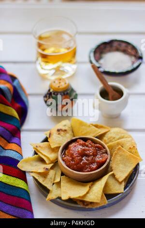 food snacks tortilla chips made of corn with salsa Stock Photo - Alamy