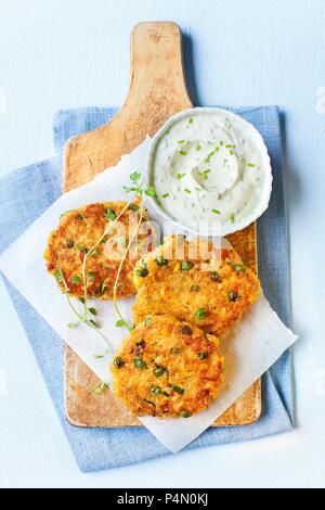Vegetable rosti with herb dip Stock Photo - Alamy