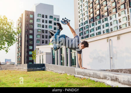 Skateboarder handstand on ramp on the sunset Stock Photo - Alamy