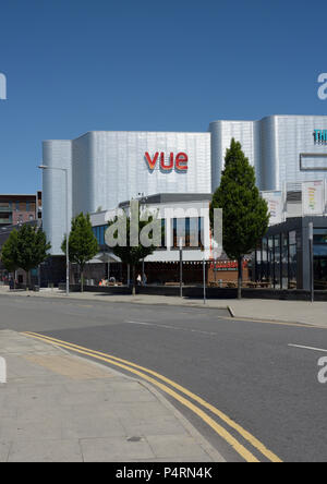 Modern buildings aluminium cladding, vue cinema, trees, pavement, road ...