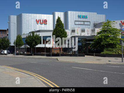 Modern buildings with aluminium cladding, vue cinema, trees pavement ...