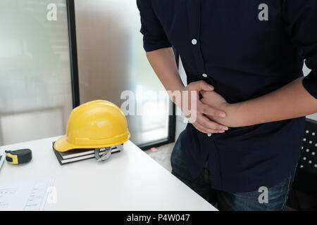 engineer suffering from stomach ulcer, stomachache. man with diarrhea ...