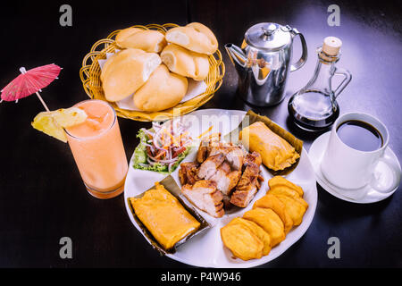peruvian food: breakfast tamales con chicharron desayuno peruano Stock ...