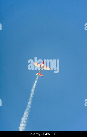 Airplane air show performance with Extra 300s aircraft Stock Photo - Alamy