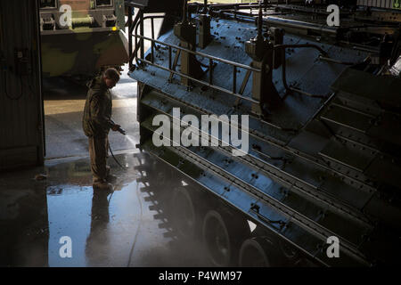 Part of the Marine Corps Prepositioning Program-Norway, vehicles are ...
