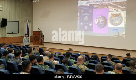CAMP AGUINALDO, Philippines. – U.S. Army Soldiers examine a map during ...