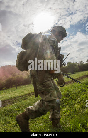 Kosovo Force (KFOR) Soldier with the U.S. Army assesses mock injuries ...