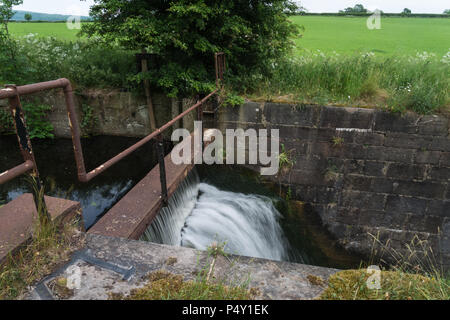 A section of the Lancaster canal and lock at Tewitfield Locks on the ...