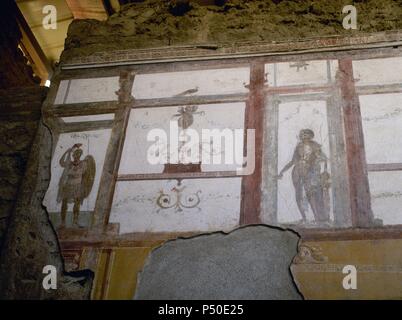 The Lararium wall paintings in the House of the Vettii in Pompeii Italy ...