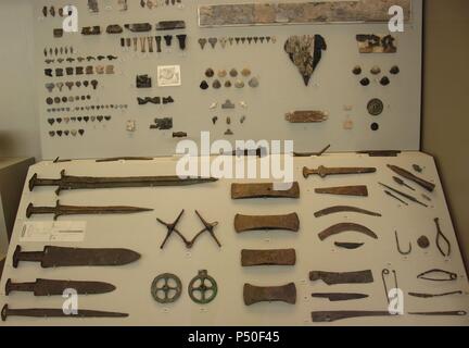 Prehistoric Art. Age of Metals. Greece. Different types of knives, axes ...