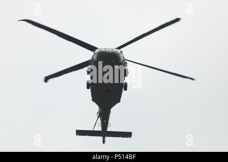 UH-60 Black Hawk door gunner prepares for liftoff from LZ Washington in ...