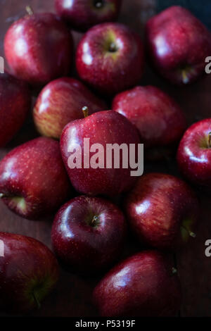 Heap of red apples in the garden Stock Photo - Alamy