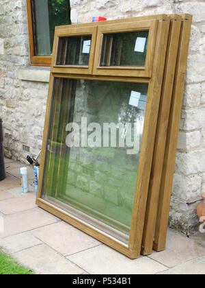 Three new double glazed solid oak window frames to be installed and replace old uPVC plastic ...