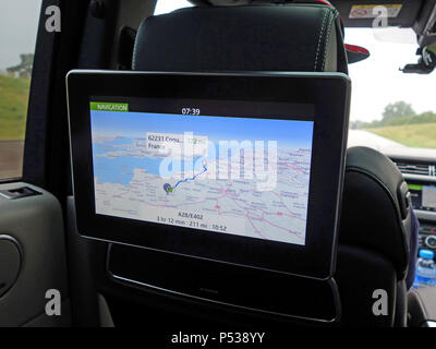 Interior of Range Rover car showing sat nav and dials on dashboard at ...