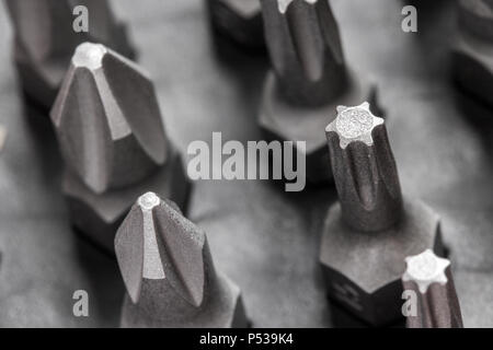 Set of bits for the screws. Selection of different shapes and bits for ...