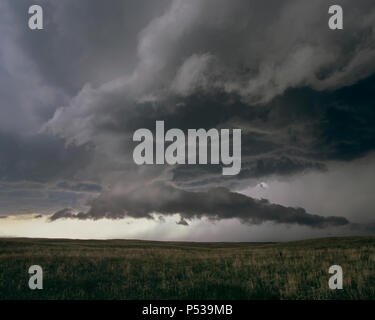 Supercell thunderstorm with rotating wallcloud over the countryside of ...