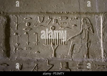 Egyptian Art. Deceased seated next to the offerings table. Relief ...