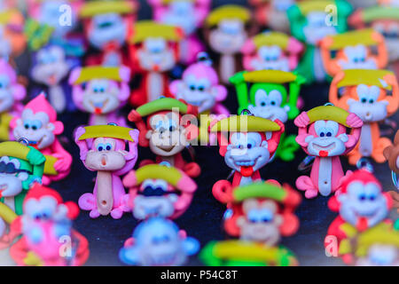 Cute Little Monkey Key Chain Made from Ceramic Clay Stock Photo - Alamy