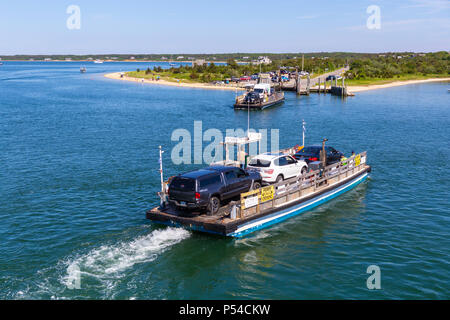 Two Chappy Ferries pass each other crossing the harbor between ...