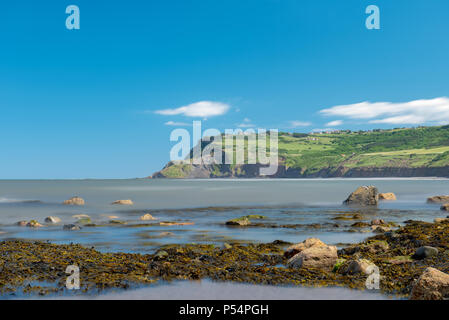 Sunny cloudy Robin Hood's Bay Stock Photo - Alamy