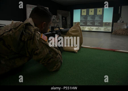 U.S. Soldiers train using the Engagement Skills Trainer II, EST II, at ...